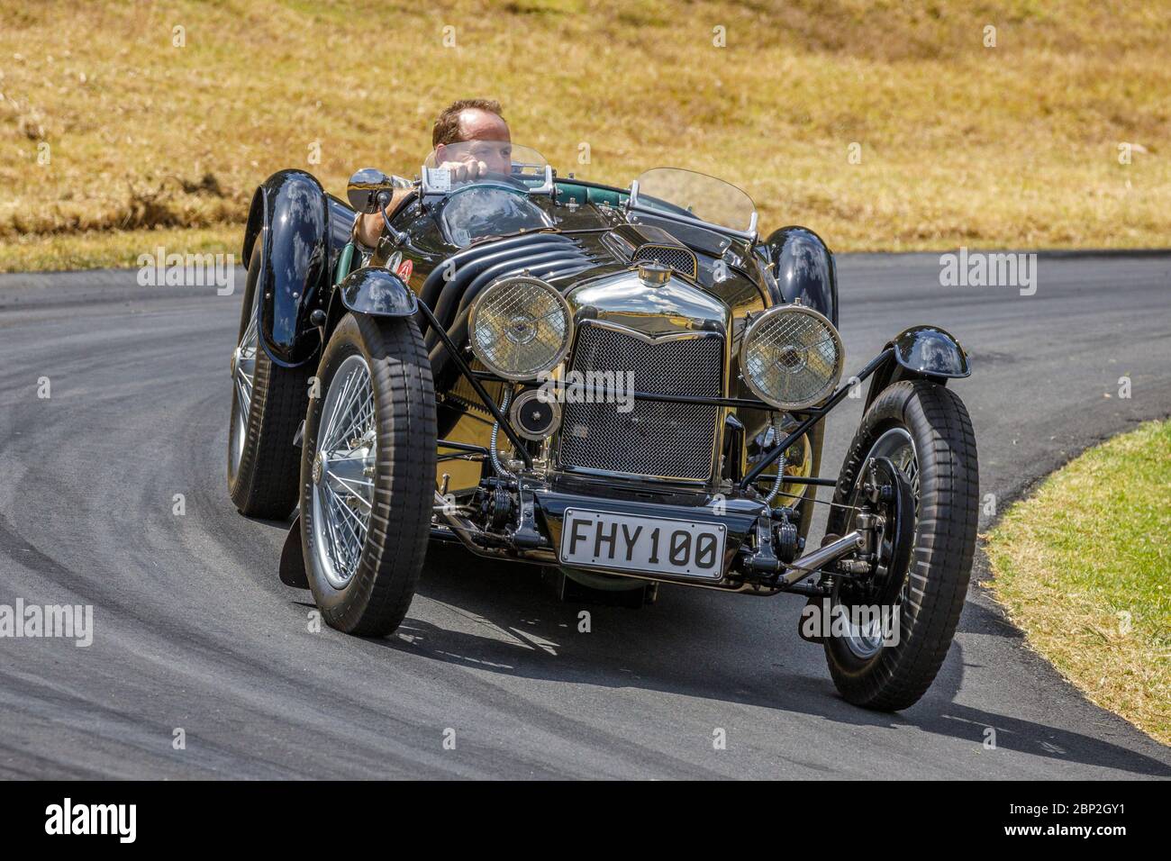 1931 Riley 9 Special Convertible with driver Rob McNair Stock Photo - Alamy