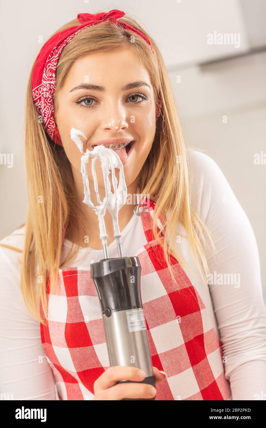 Licking whisk hi-res stock photography and images - Alamy