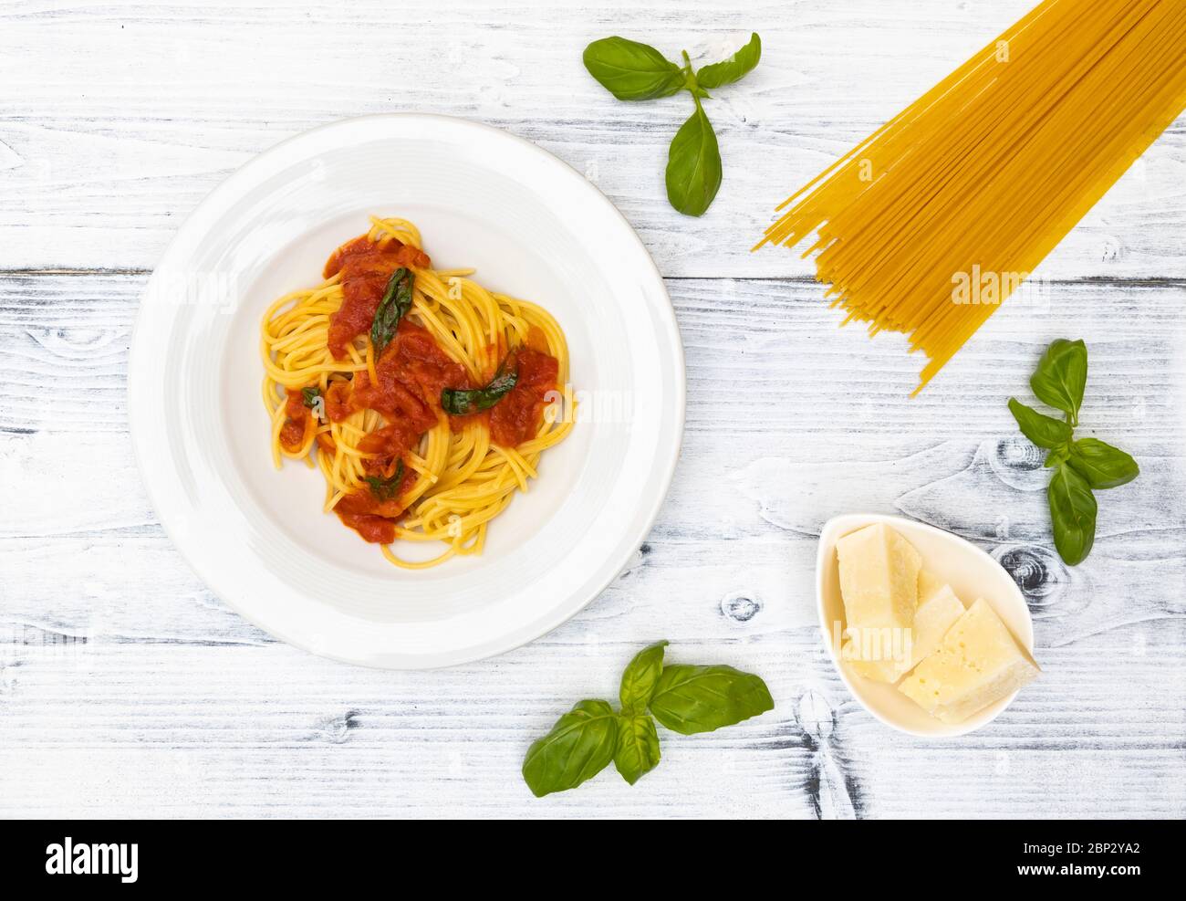 still life with spaghetti with tomato sauce and basil Stock Photo - Alamy