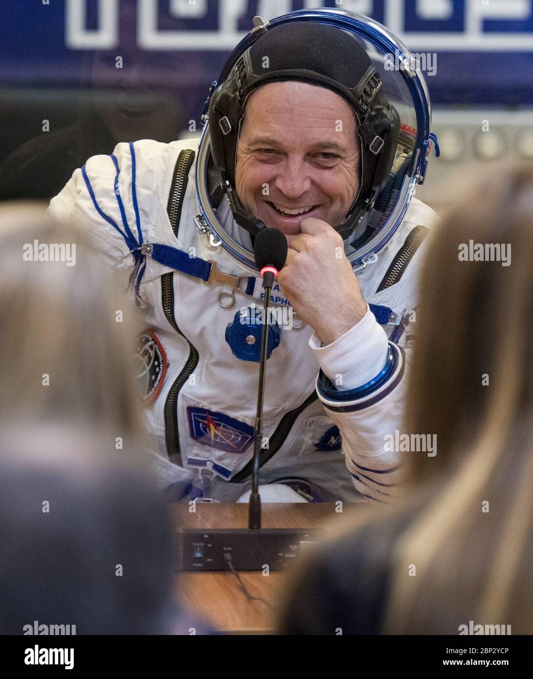 NASA astronaut Ricky Arnold speaks with family and friends after his ...