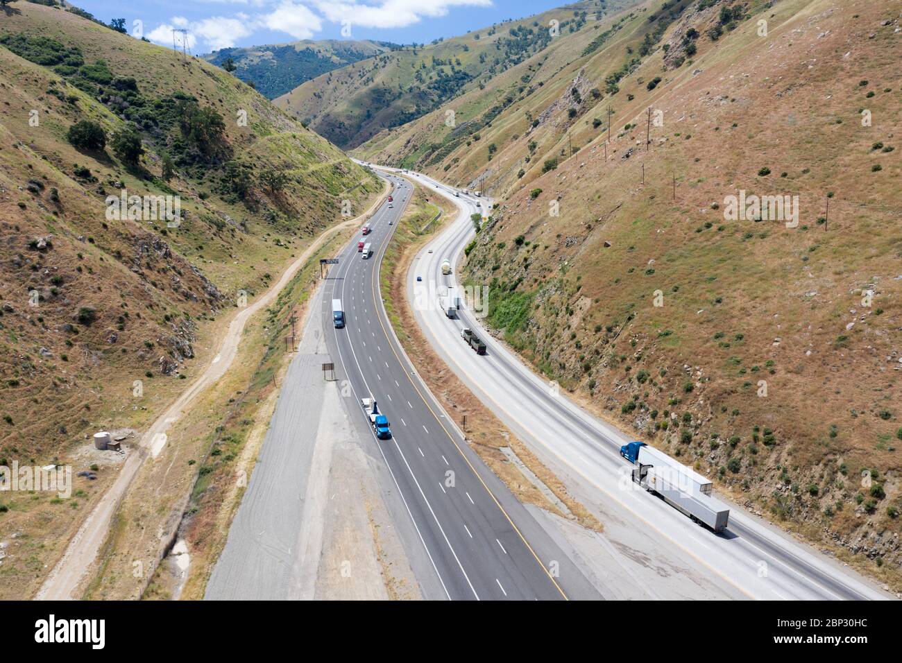 Aerial views of interstate 5 in along the famous grapevine on the Tejon ...