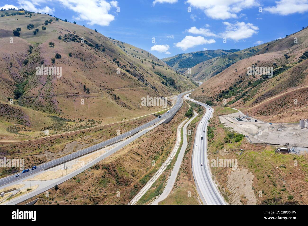 Aerial views of interstate 5 in along the famous grapevine on the Tejon ...