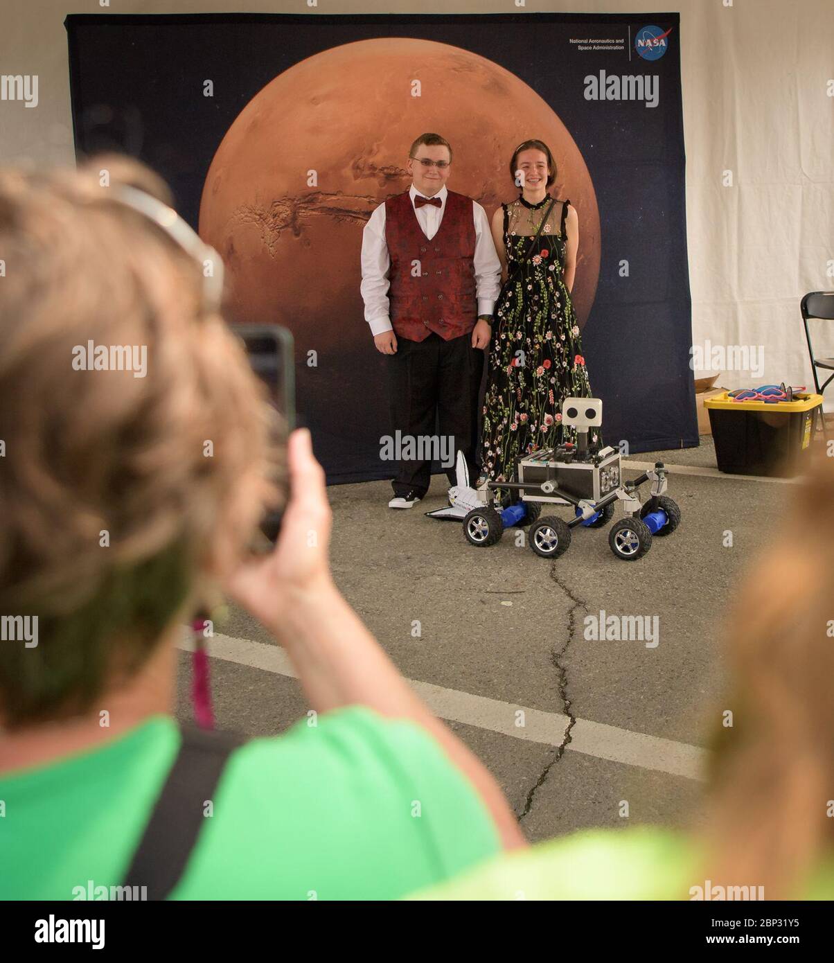 On June 1, 2019, a young couple paused to take in the Mars Celebration ...
