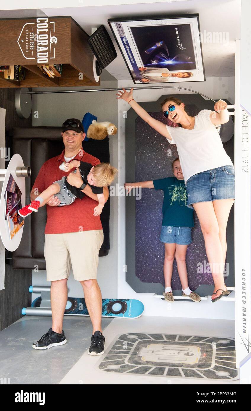 On July 18, 2019, visitors explored the Lockheed Martin exhibit at the ...