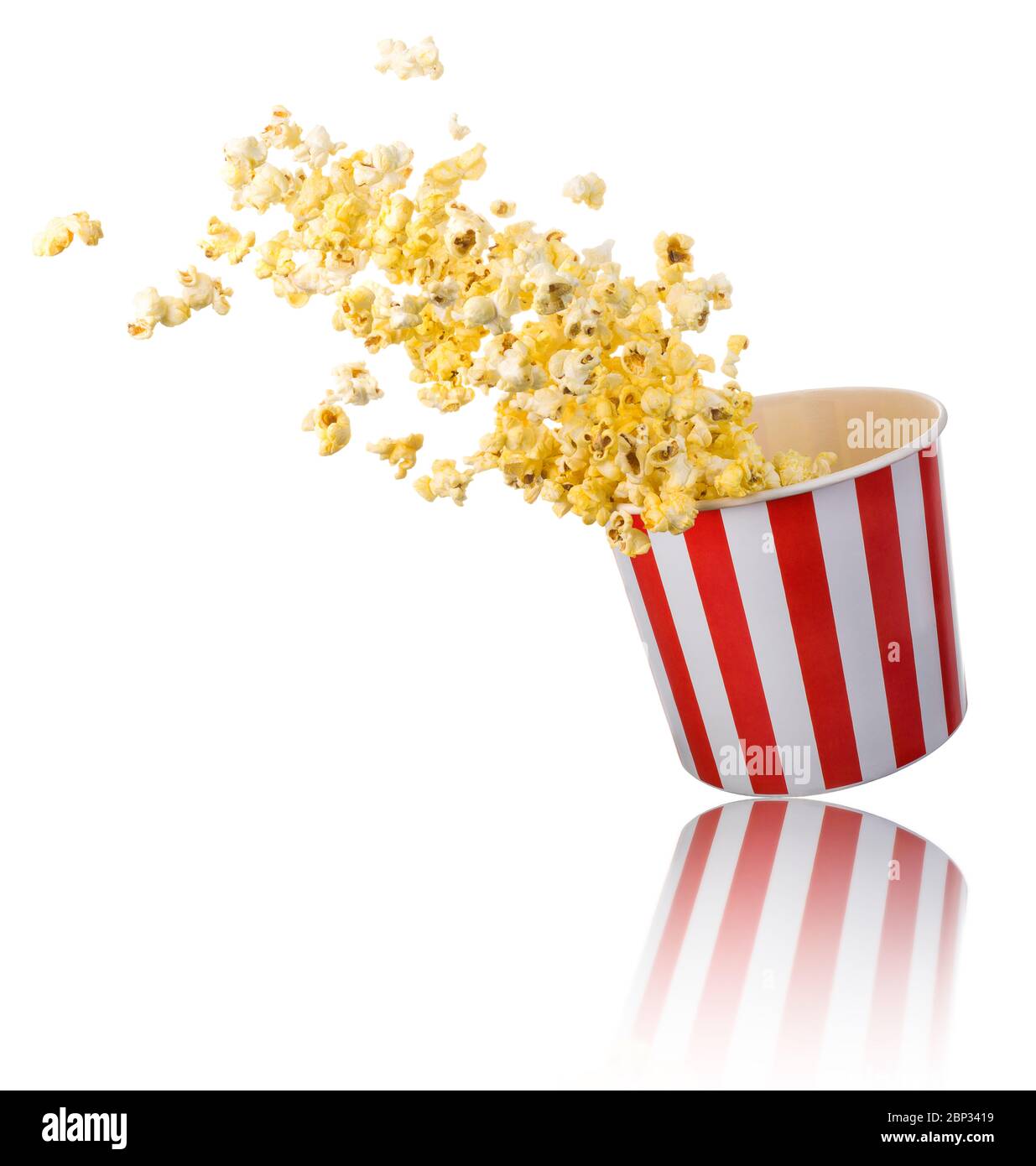 Flying popcorn from paper striped bucket isolated on white background ...