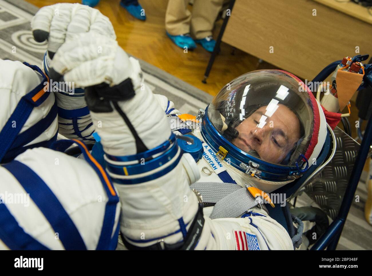 Expedition 60 flight engineer Drew Morgan of NASA undergoes a pressure ...