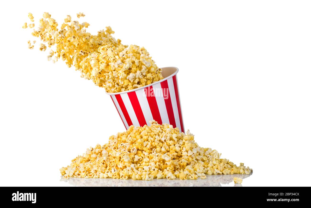 Flying popcorn from paper striped bucket and scattered popcorn isolated ...