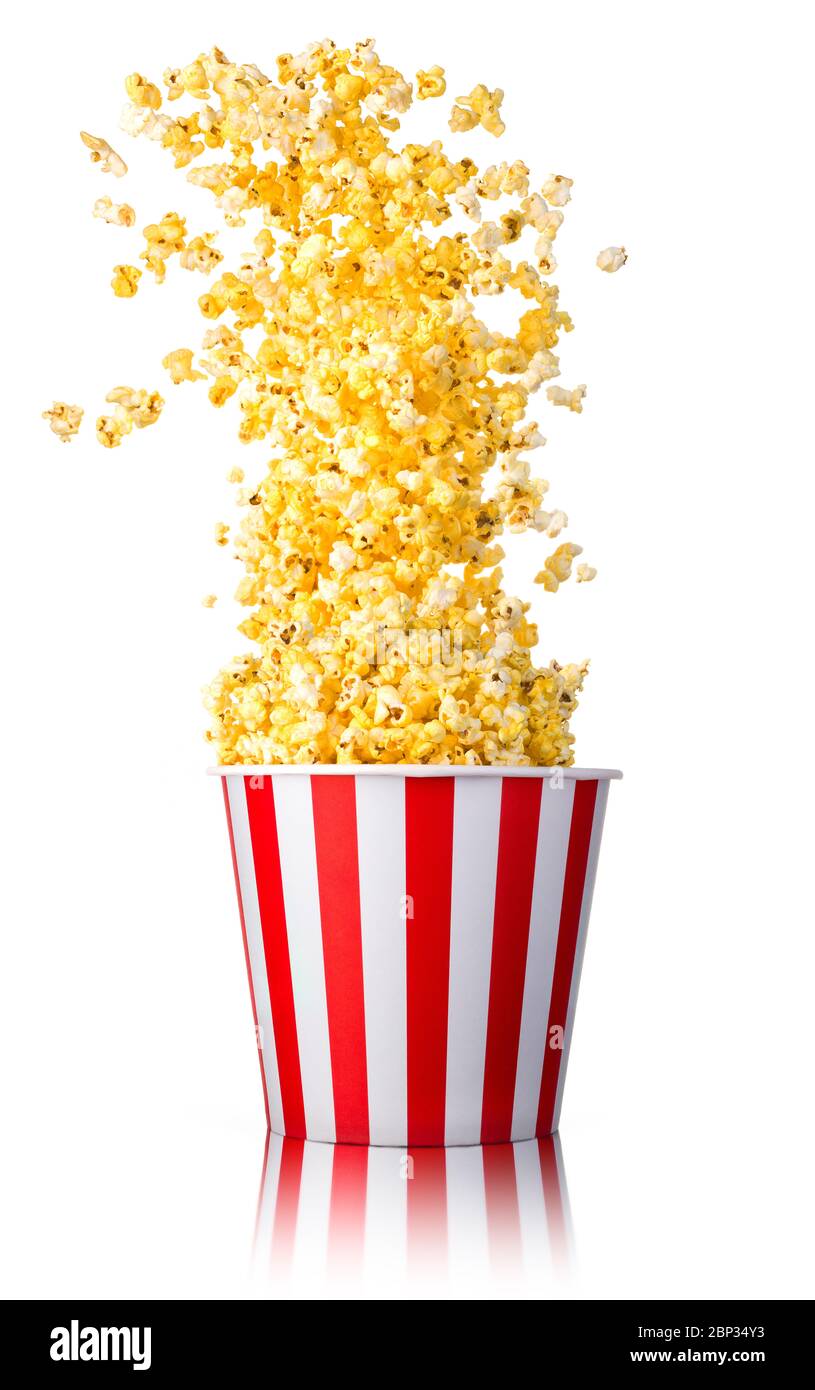 Flying popcorn from paper striped bucket isolated on white background ...