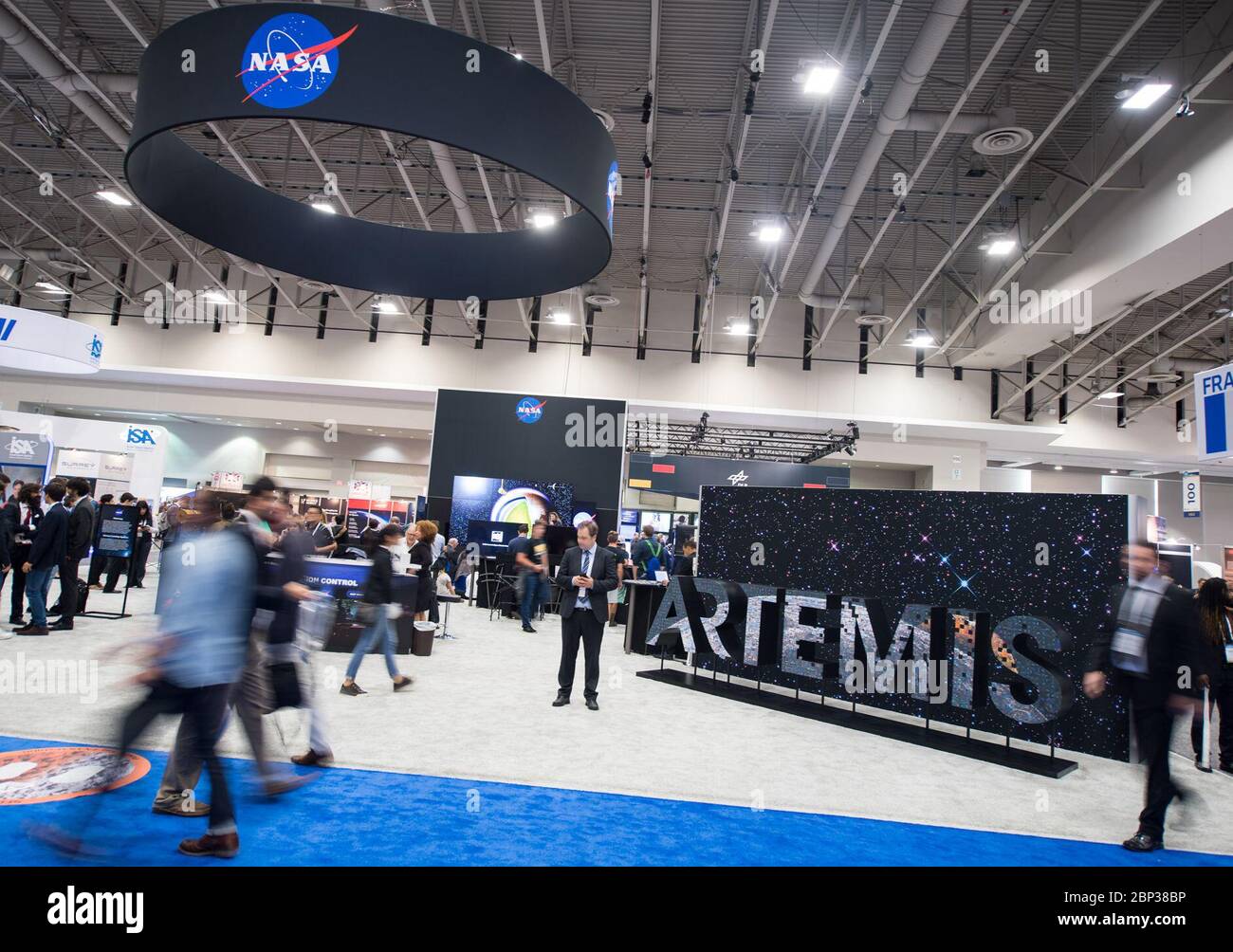 Attendees at the 70th International Astronautical Congress visit the ...