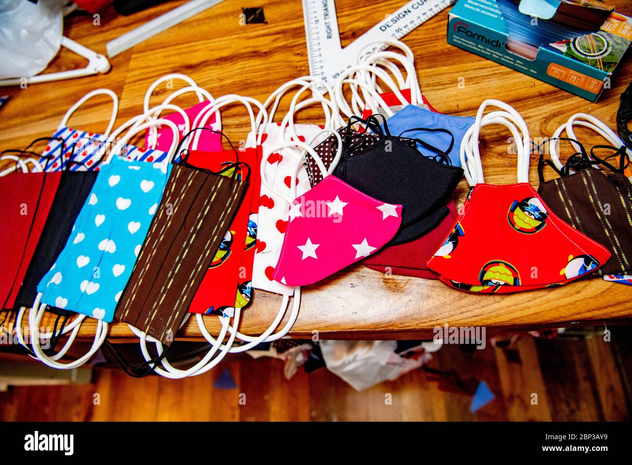 Colourful face masks for sale at a store.Various shops are selling face ...