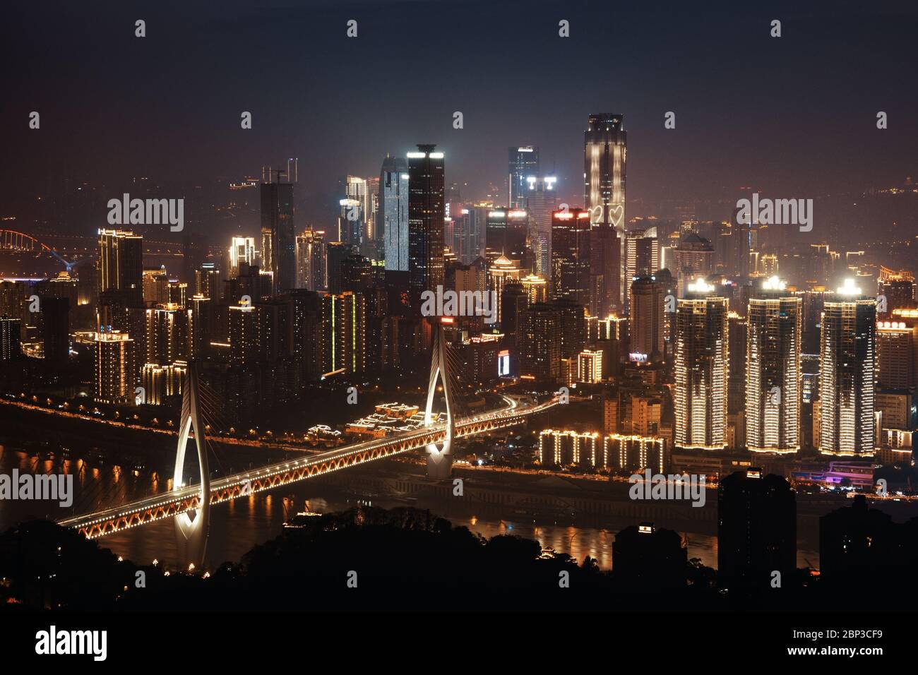 Bridge and city urban architecture at night in Chongqing, China Stock ...