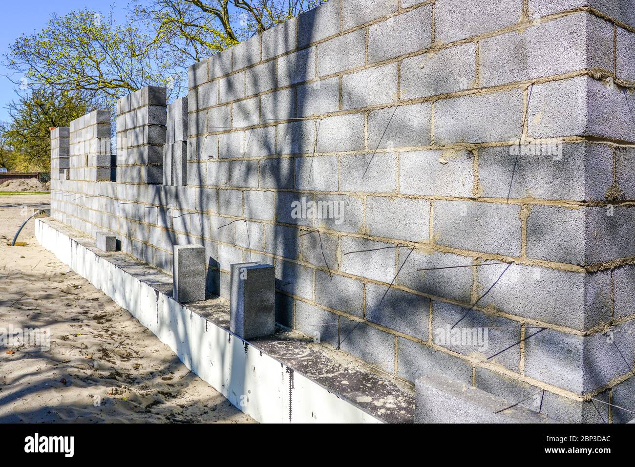 construction of a new residential house from building blocks ...