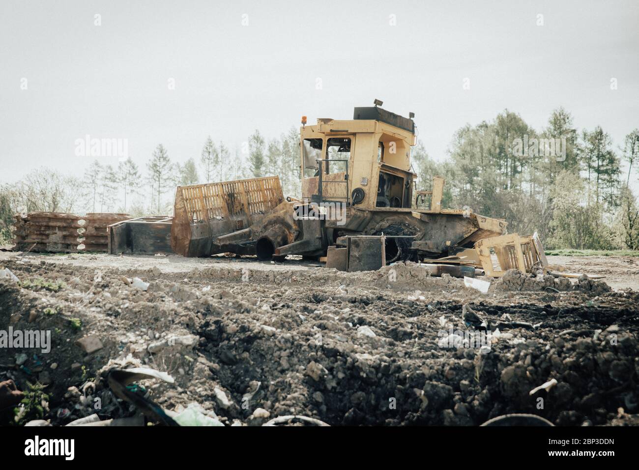 old broken compactor at a landfill Stock Photo - Alamy