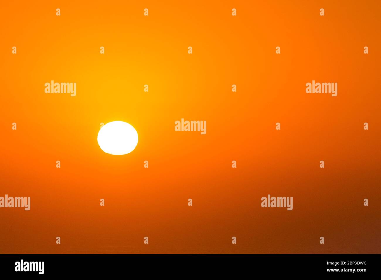 Amazing real sun over Ocean, orange sky during sunset, nature ...