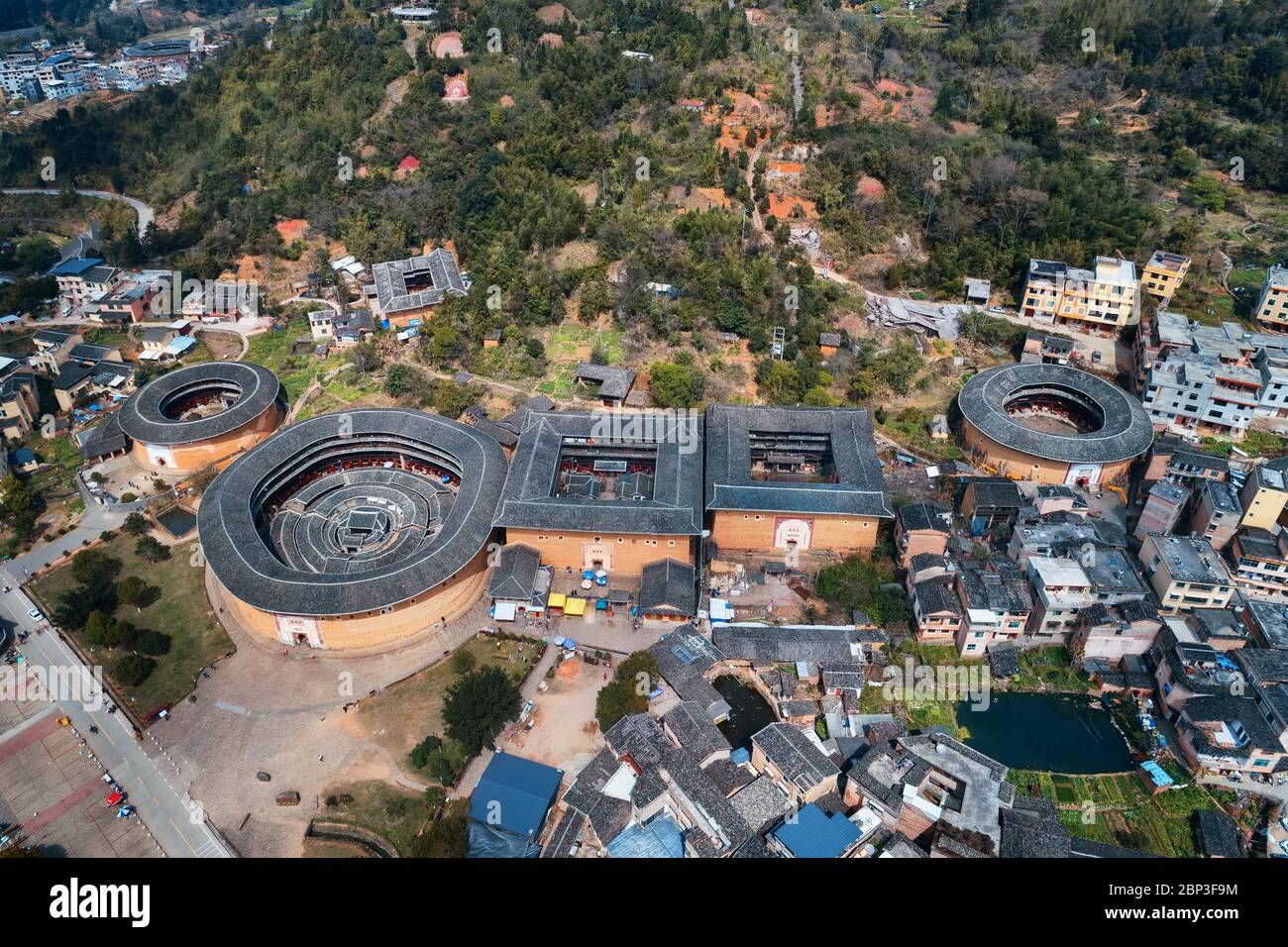 Aerial view of Tulou, the unique dwellings of Hakka in Fujian, China ...