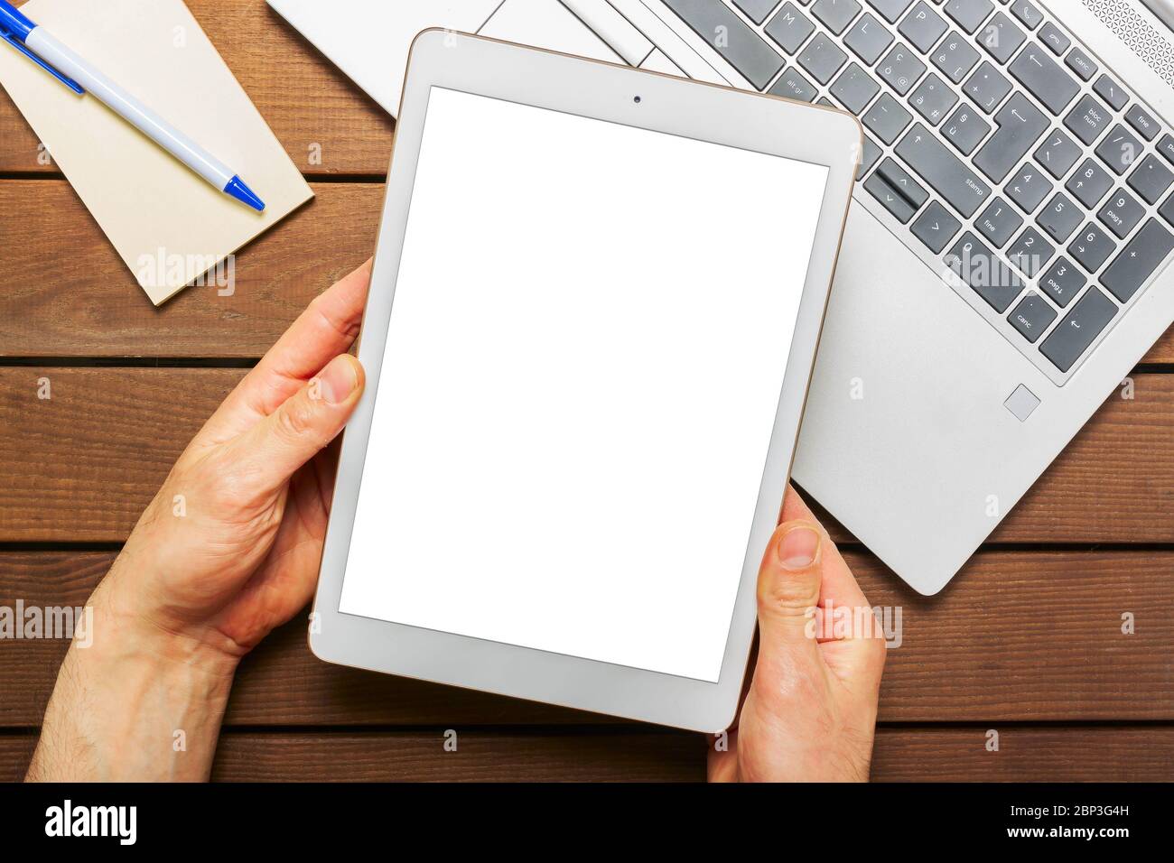 hand showing digital tablet blank screen on work desk Stock Photo - Alamy
