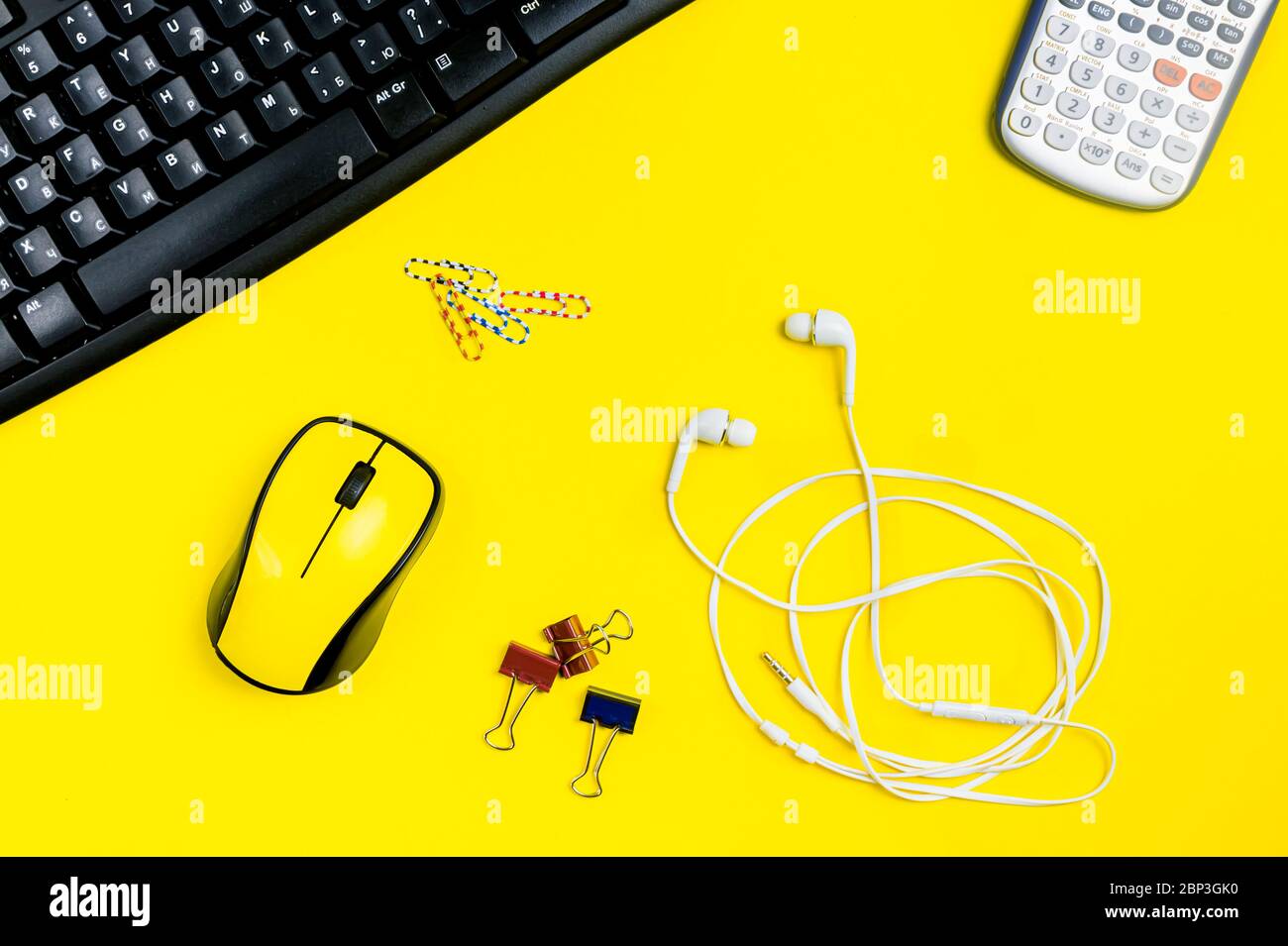 flat lay workspace yellow computer mouse, office accessory on yellow ...
