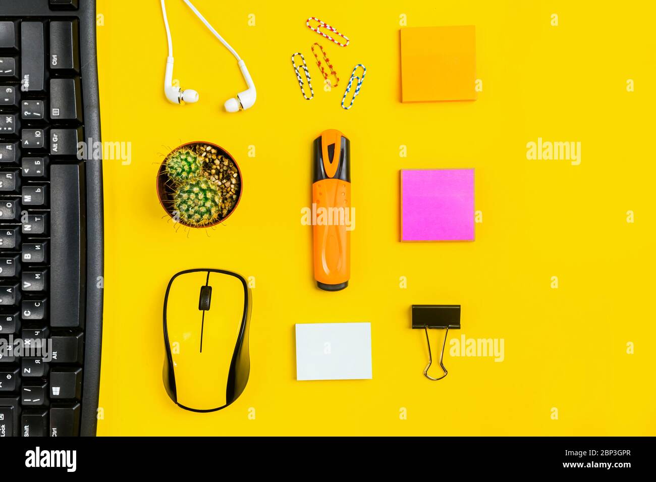 flat lay workspace yellow computer mouse, office accessory on yellow ...