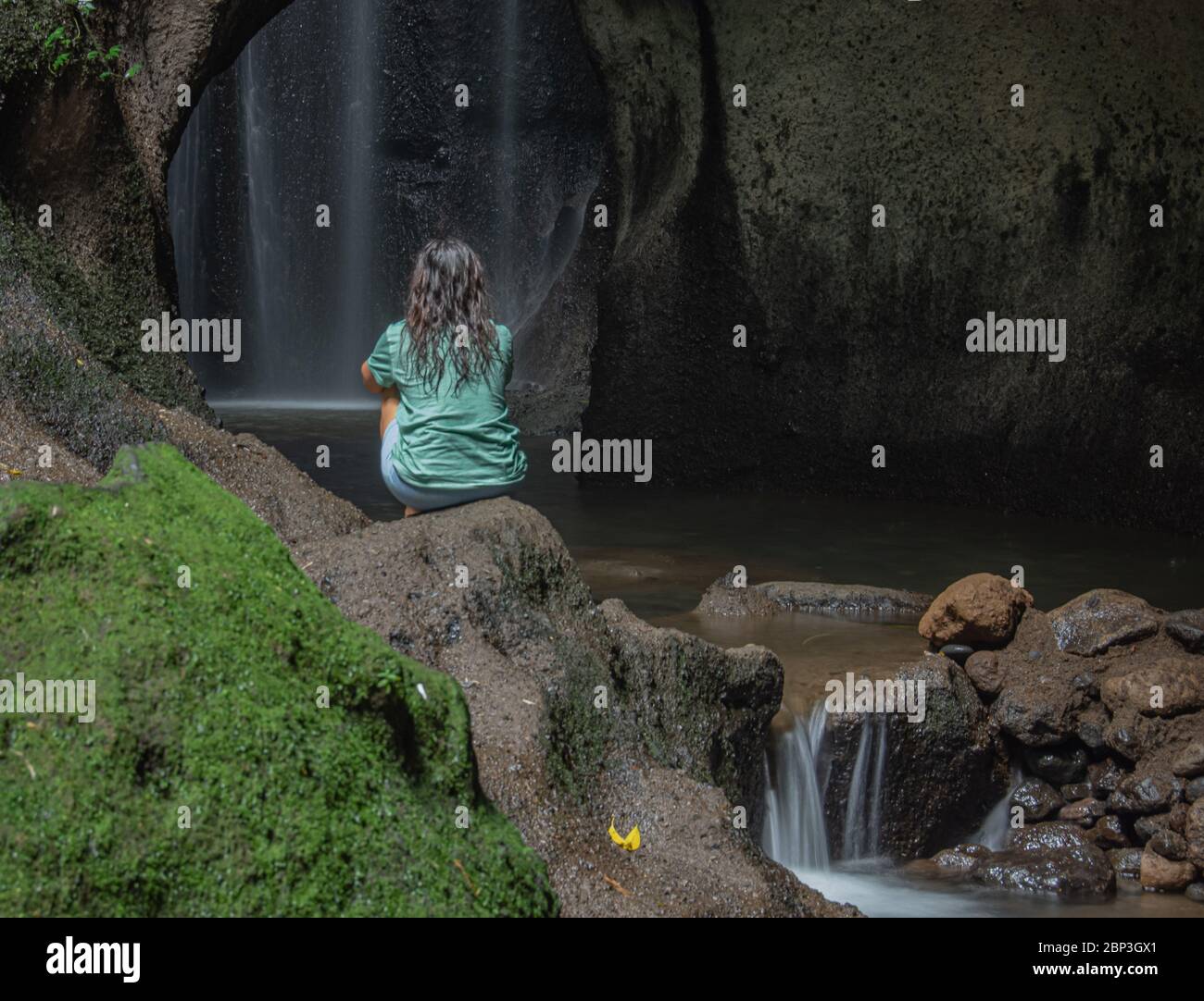 girl on waterfall from a natural park in ubud, bali Stock Photo - Alamy