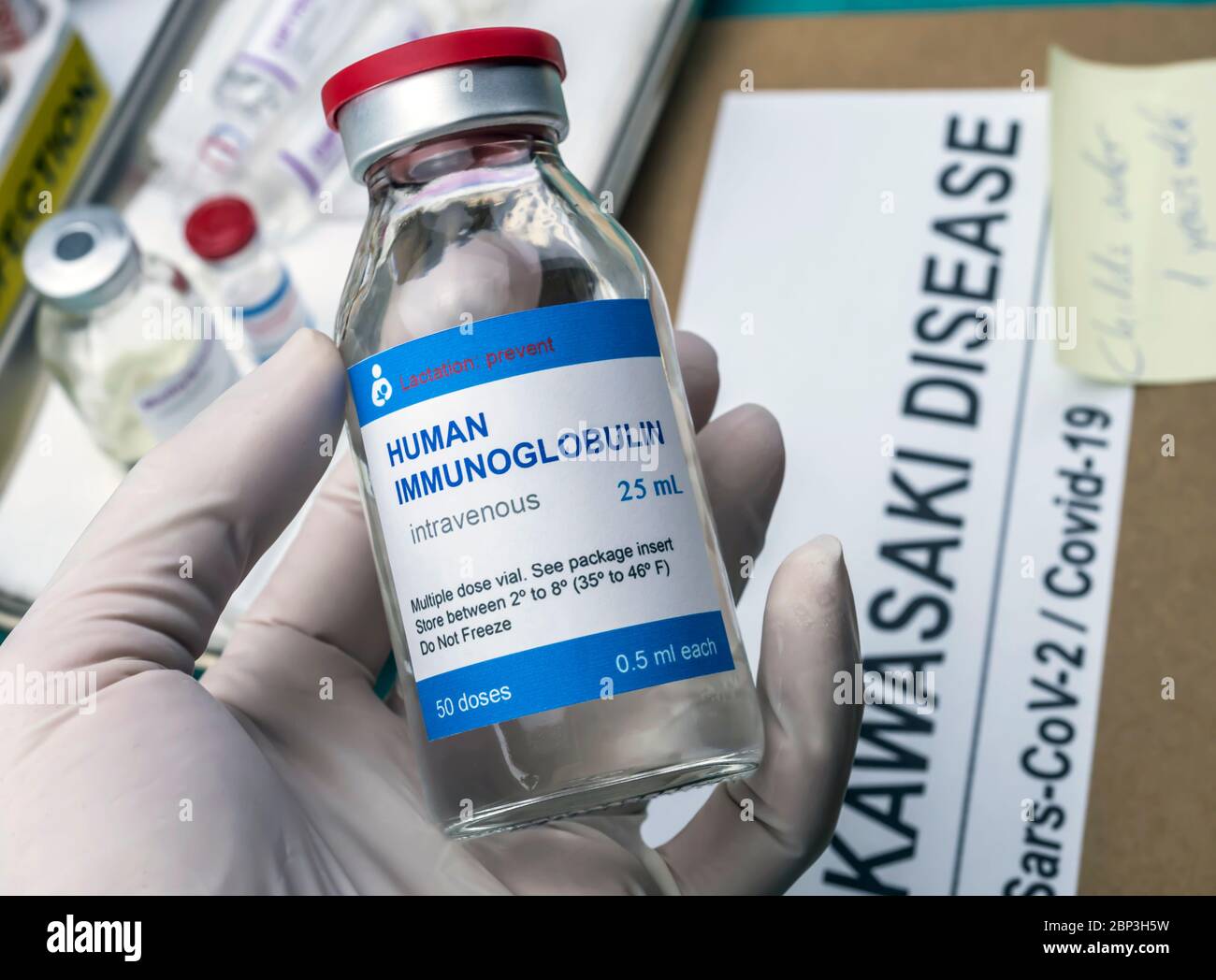 Nurse hold human immunoglobulin vial generic drug to treat Sars-CoV-2 ...