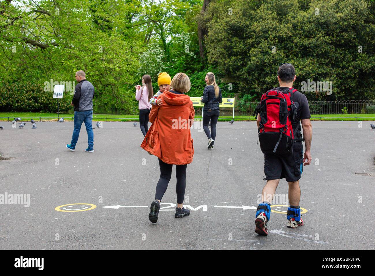 Social distancing measures in St. Stephen`s Green Park in Dublin ...