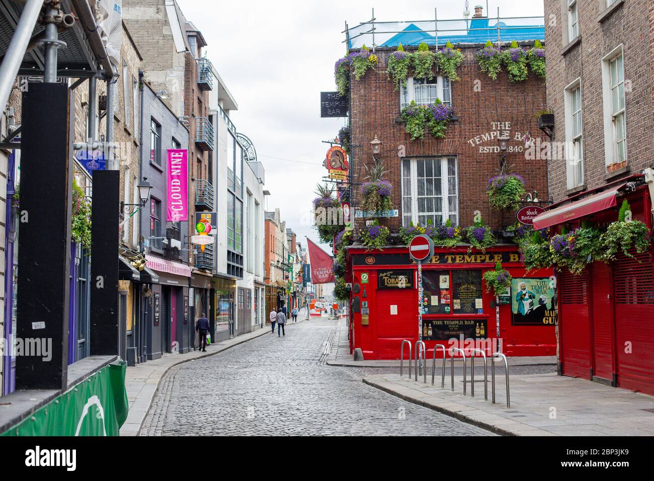 Deserted cobbled Dublin`s Temple Lane with the Temple Bar Pub in the ...