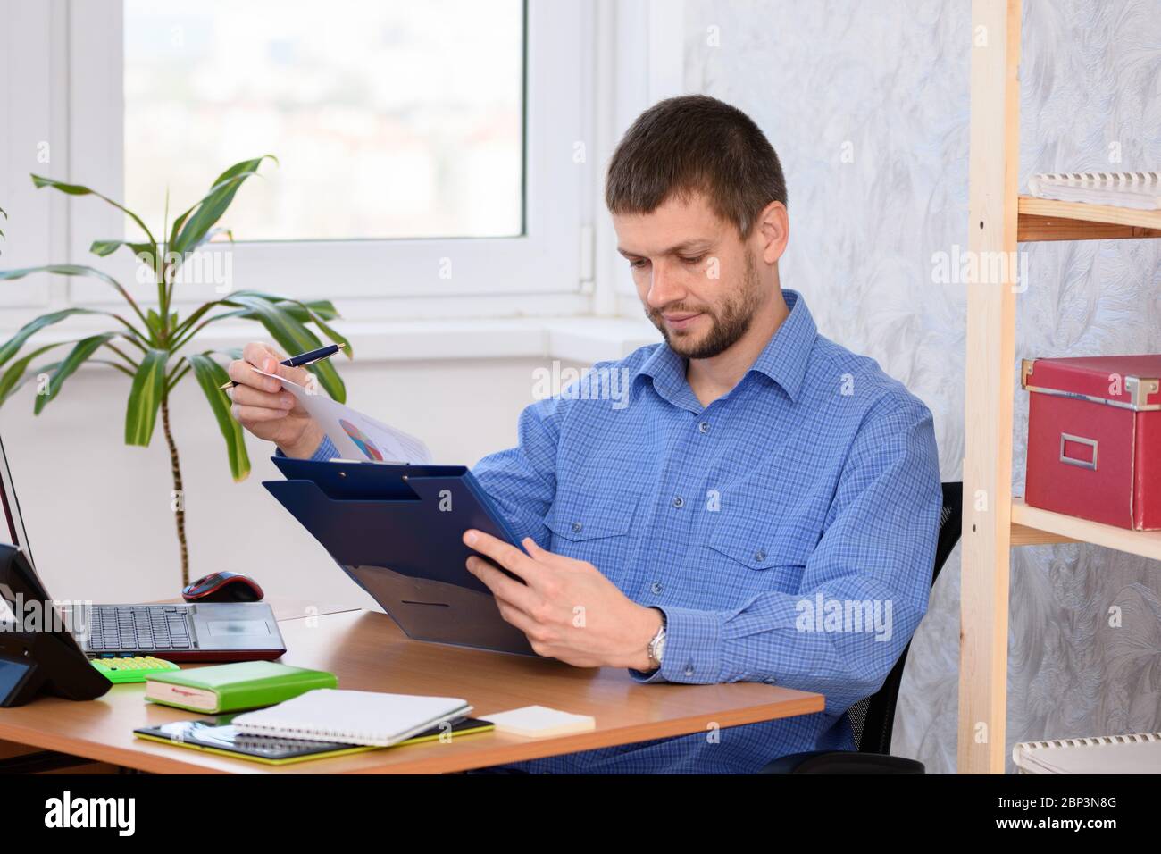 Bearded businessman paper folder hi-res stock photography and images ...