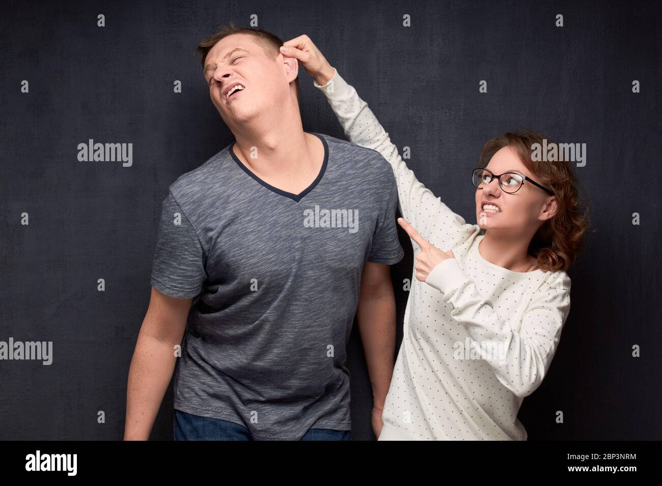 Ear Pulling High Resolution Stock Photography and Images - Alamy