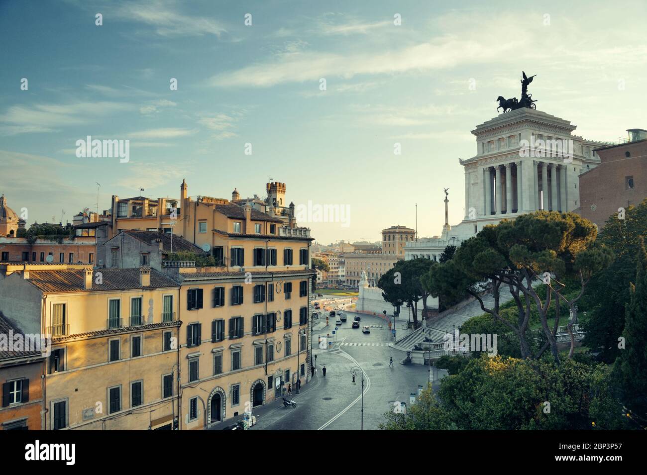 Street view with National Monument to Victor Emmanuel II in Rome, Italy ...