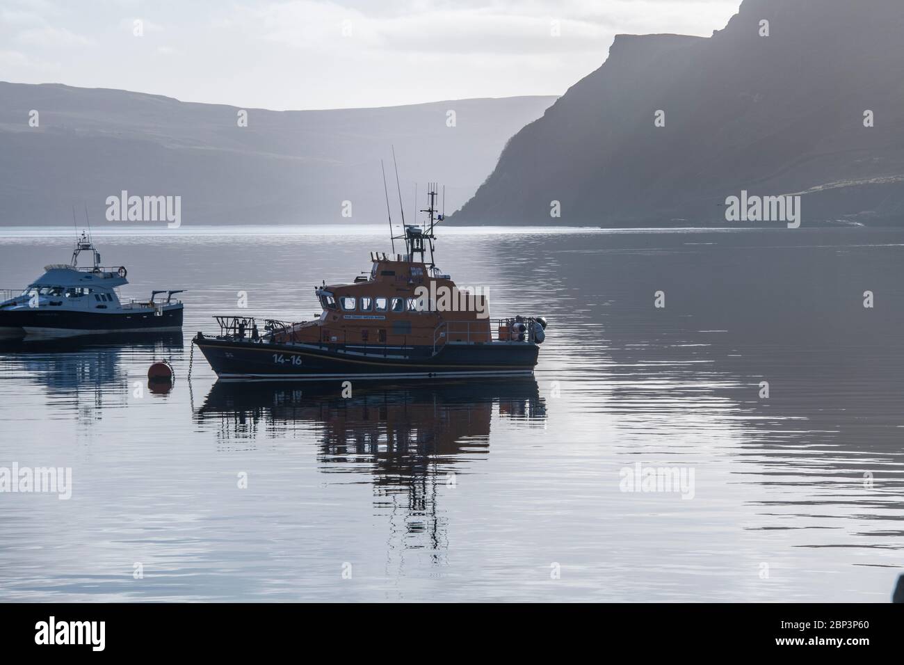 A Trent class RNLI lifeboat in the harbour of Portree, the capital of ...