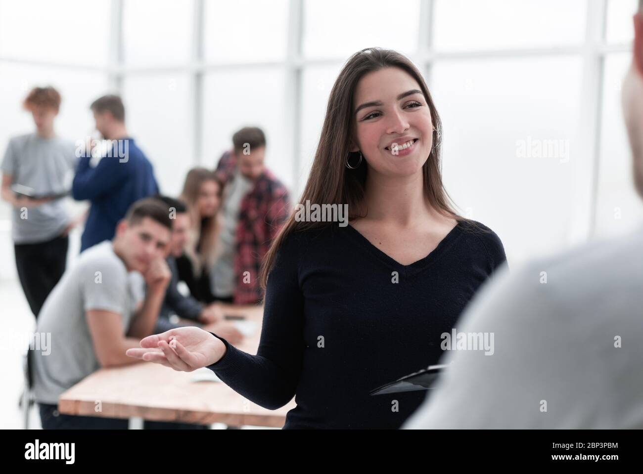 group of office employees in the workplace Stock Photo - Alamy