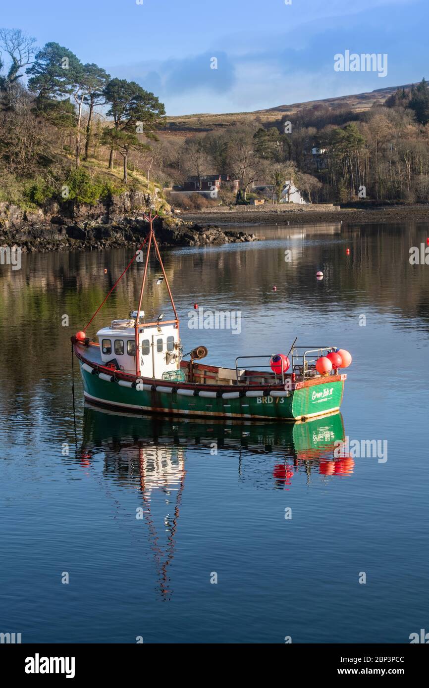Fishing boats in the harbour of Portree, the capital of the Isle of ...