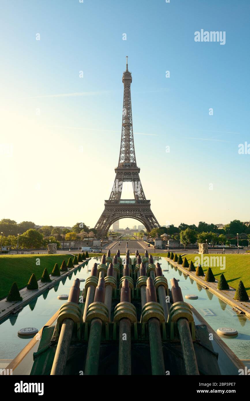 Eiffel Tower with fountain pipe as the famous city landmark in Paris ...