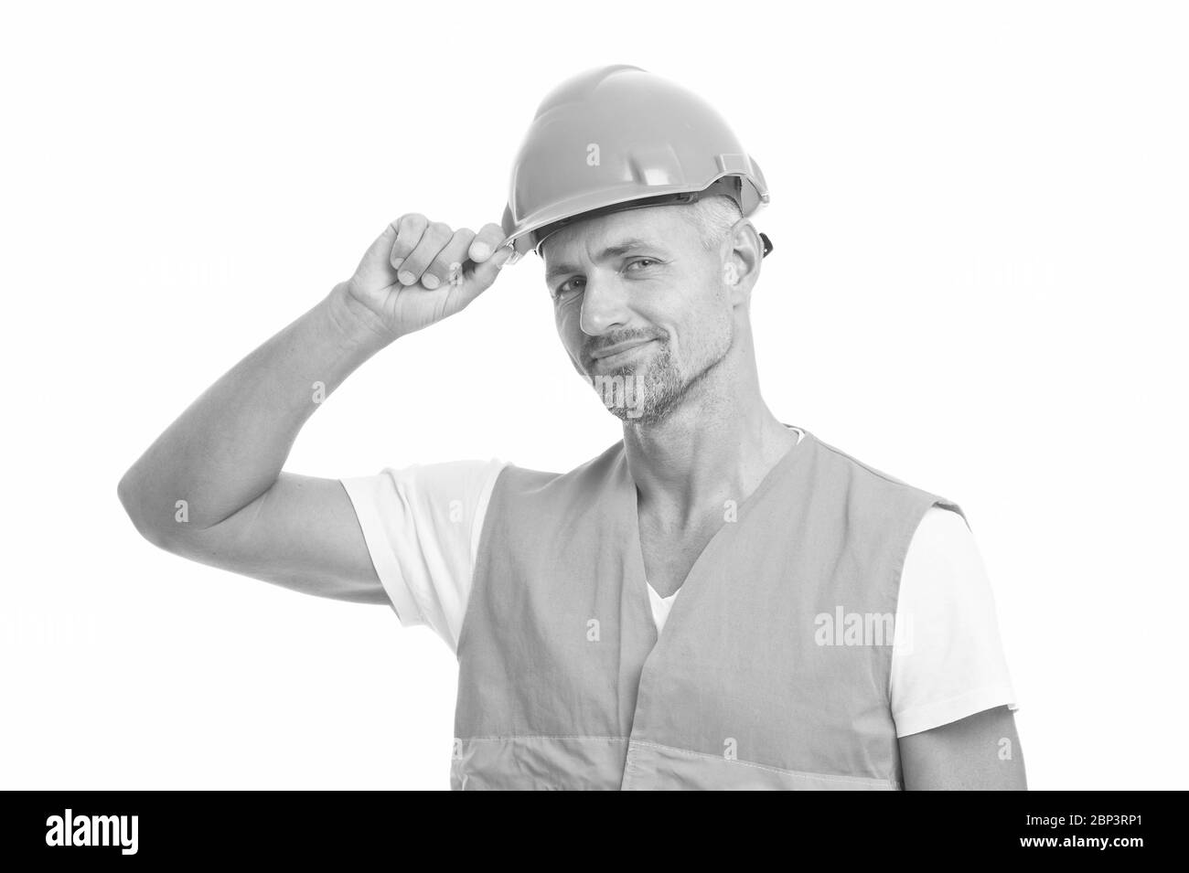 handsome firefighter in helmet. fire safety. man with welcome gesture ...