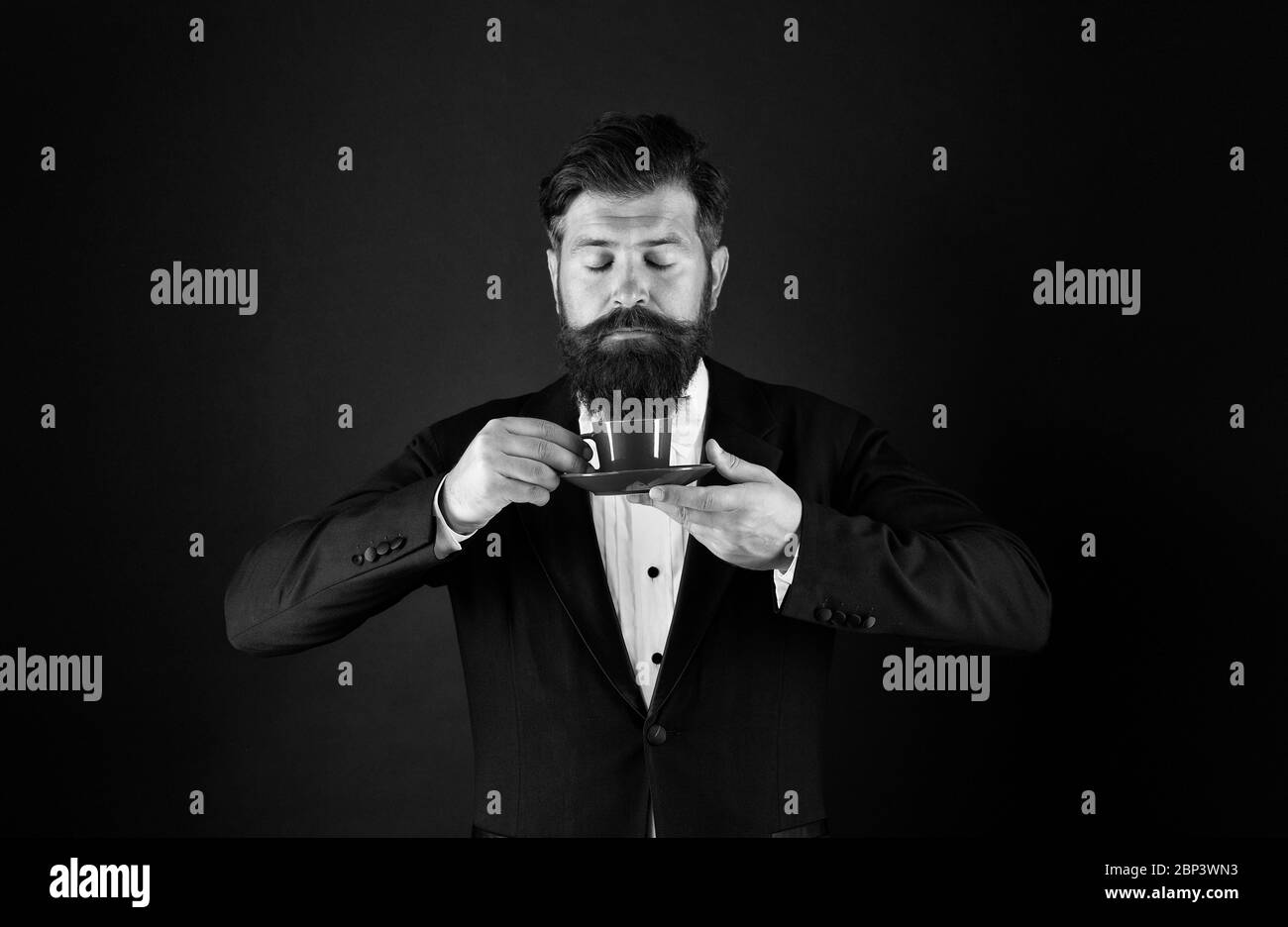 Serving perfect espresso. Man bearded hipster drinking coffee. Drinking ...