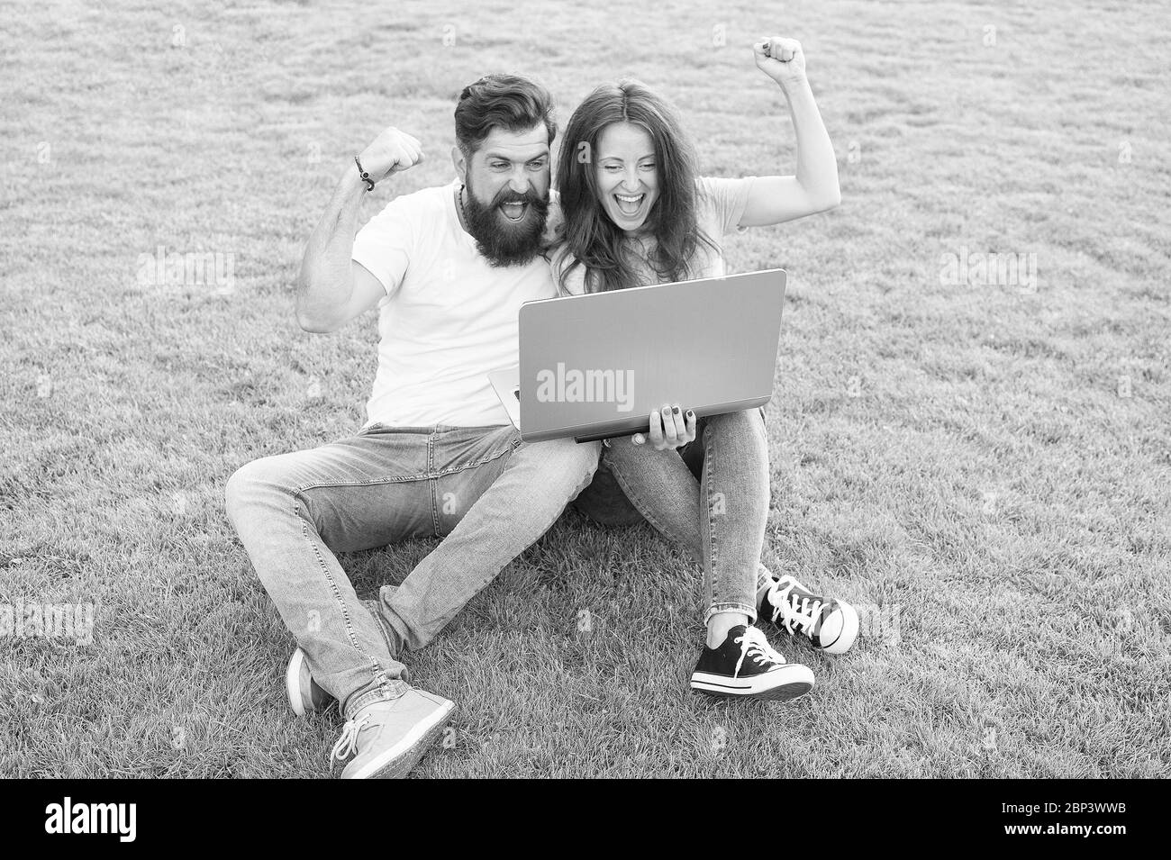 Happy couple notebook Black and White Stock Photos & Images - Alamy