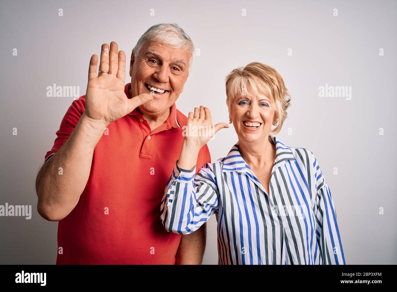 Senior couple waving goodbye hi-res stock photography and images - Alamy