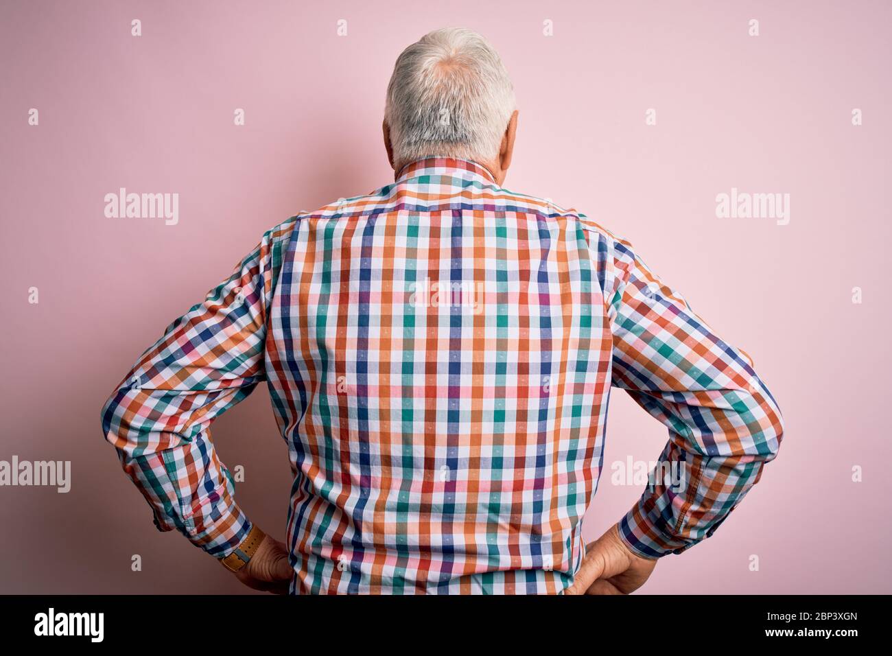 Senior handsome hoary man wearing casual colorful shirt over isolated ...