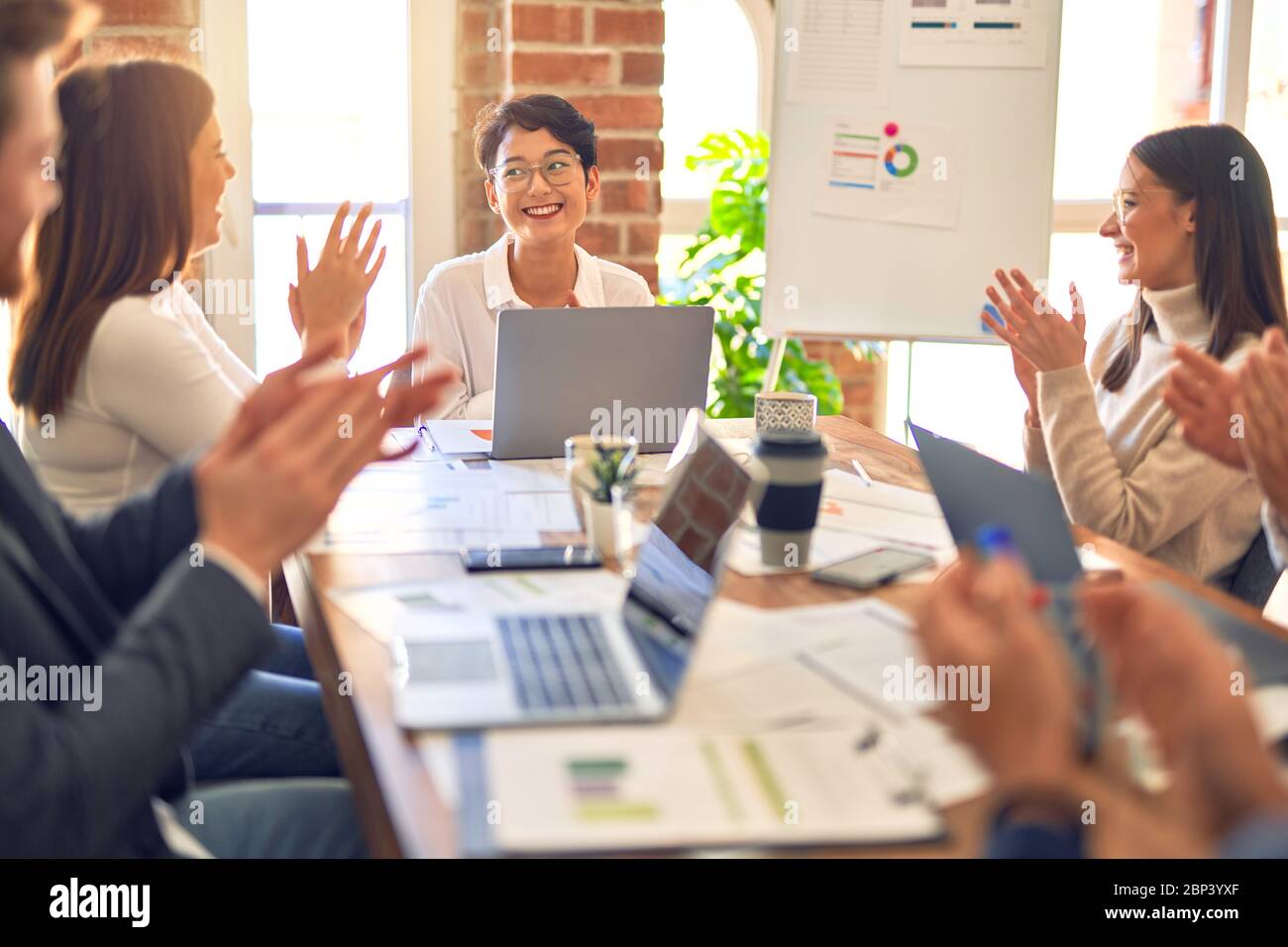 Group of business workers smiling happy and confident. Working together ...
