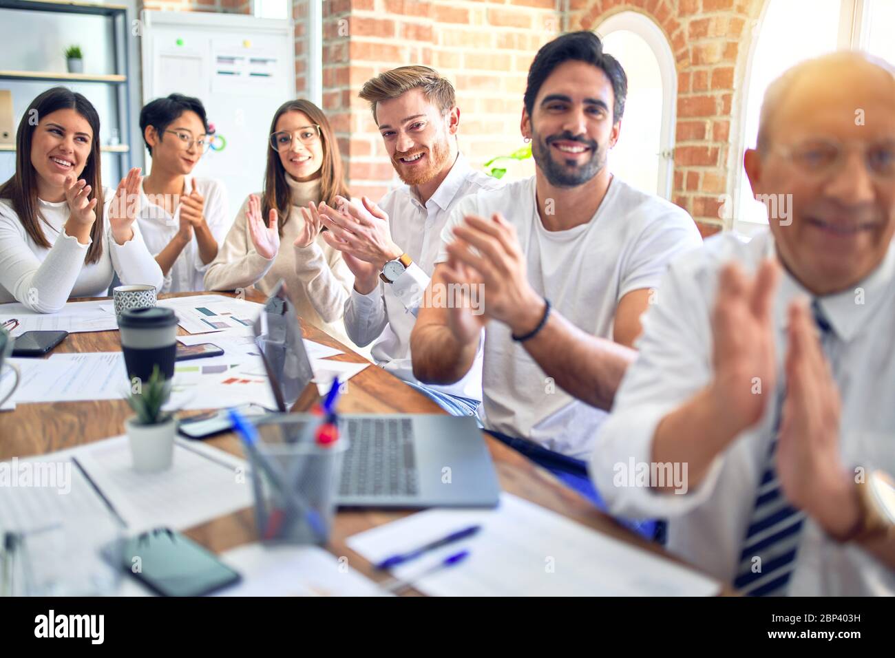 Group of business workers smiling happy and confident. Working together ...