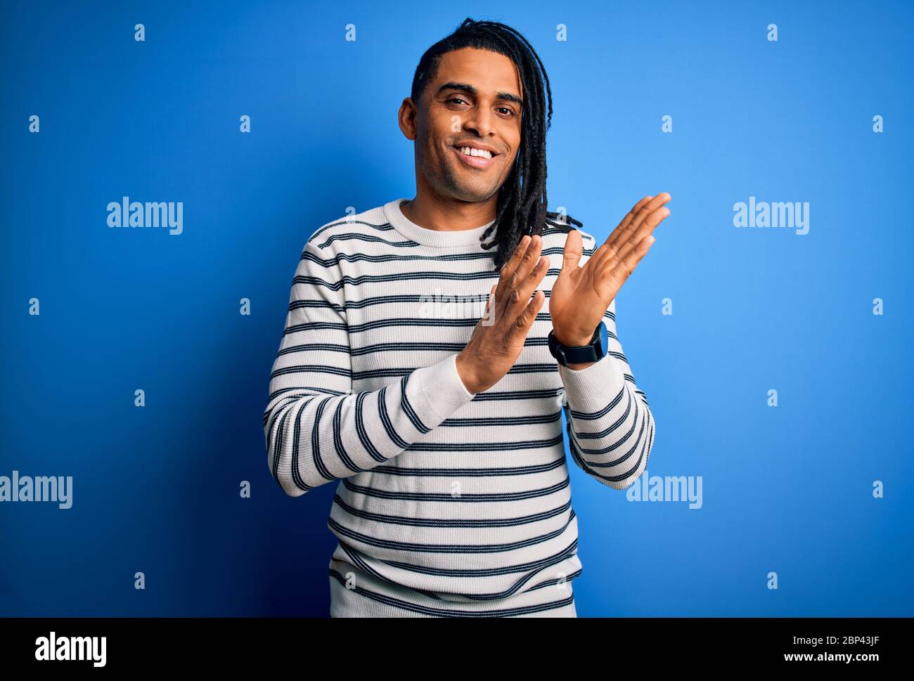 Joyful black man clapping hands hi-res stock photography and images - Alamy