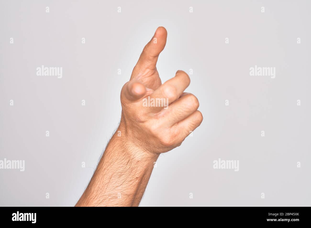 Hand of caucasian young man showing fingers over isolated white ...