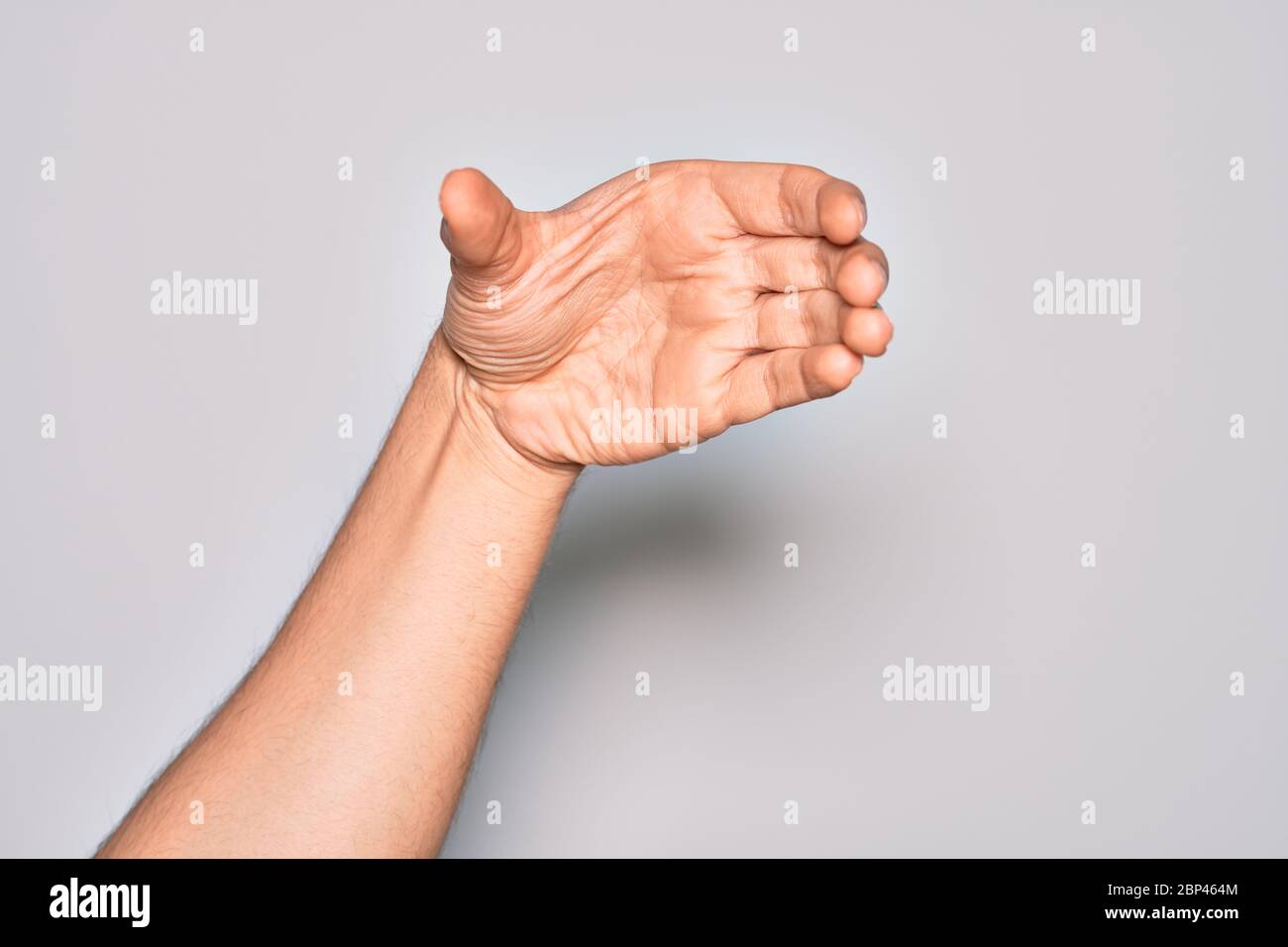 Hand of caucasian young man showing fingers over isolated white ...