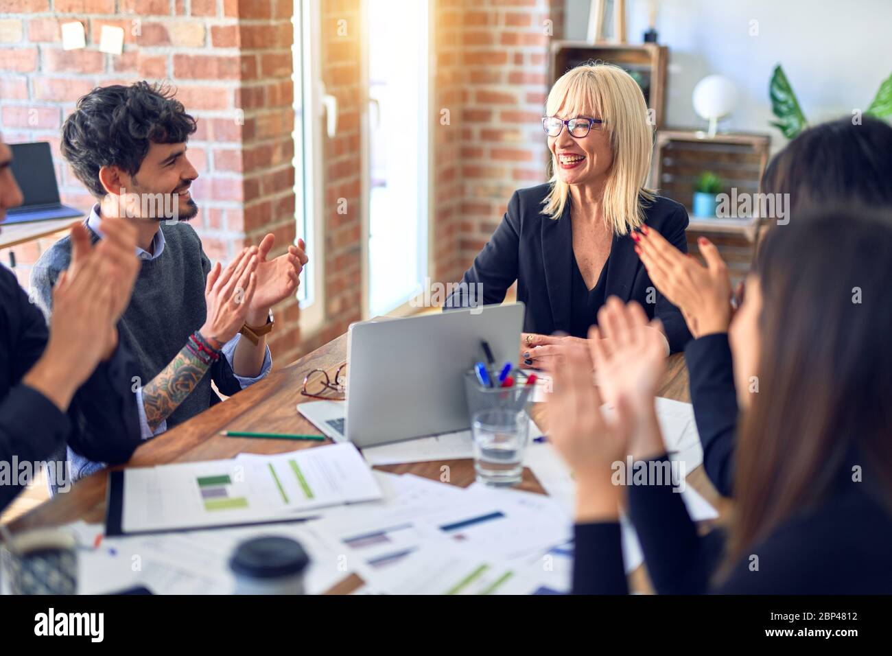Group of business workers smiling happy and confident. Working together ...