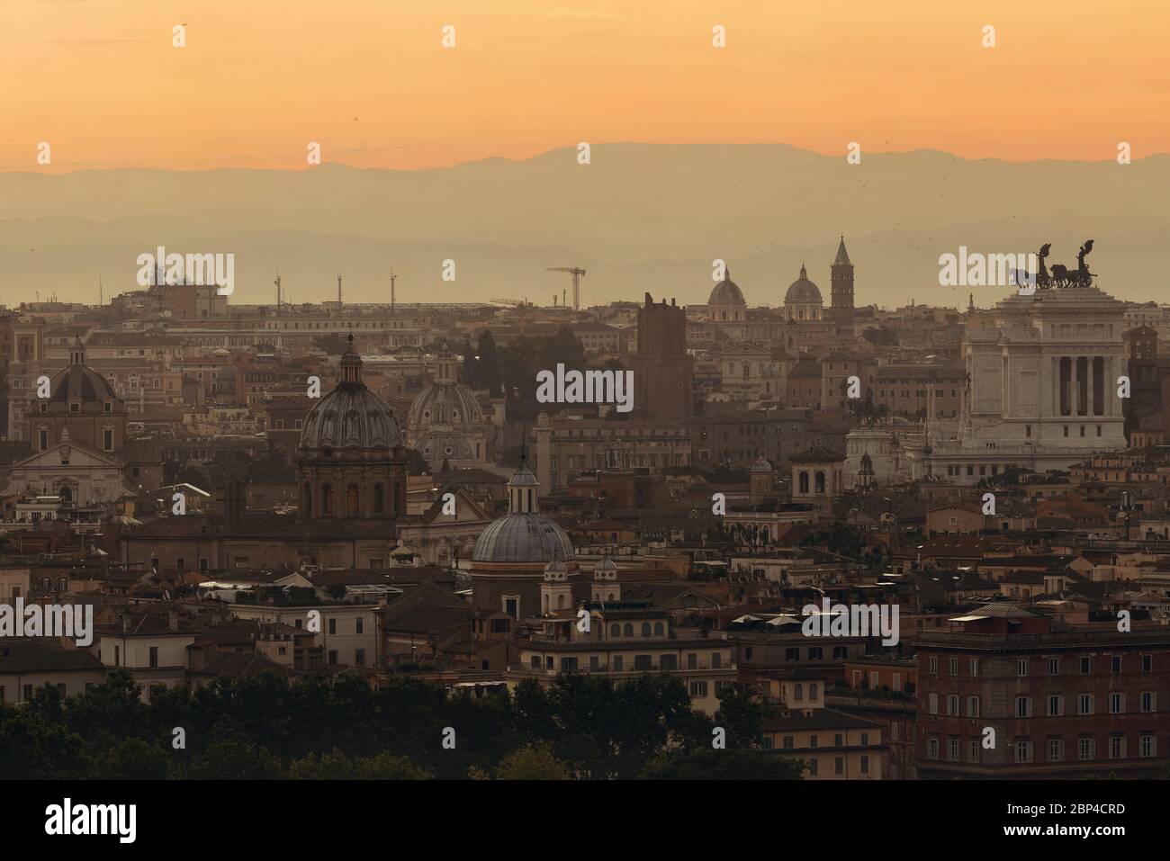 Rome rooftop view with ancient architecture in Italy before sunrise ...
