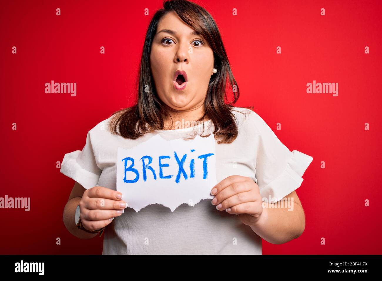 Beautiful plus size woman holding brexit banner for political ...