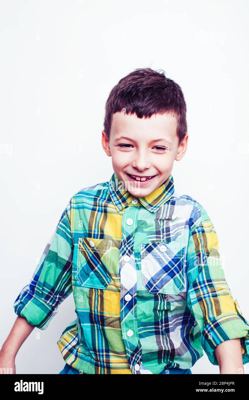 little cute real boy on white background gesture smiling close up ...