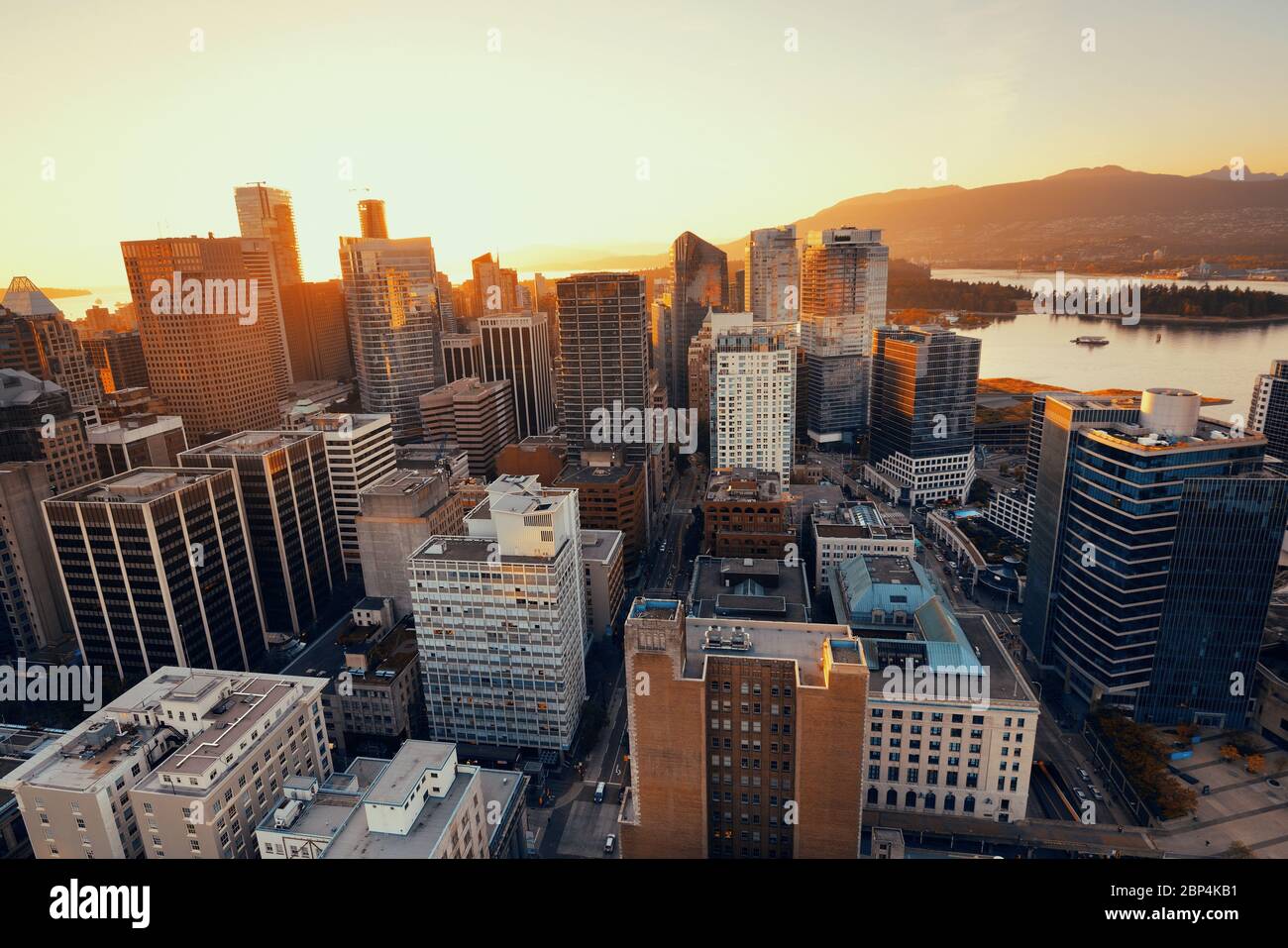 Vancouver rooftop view with urban architectures at sunset Stock Photo ...