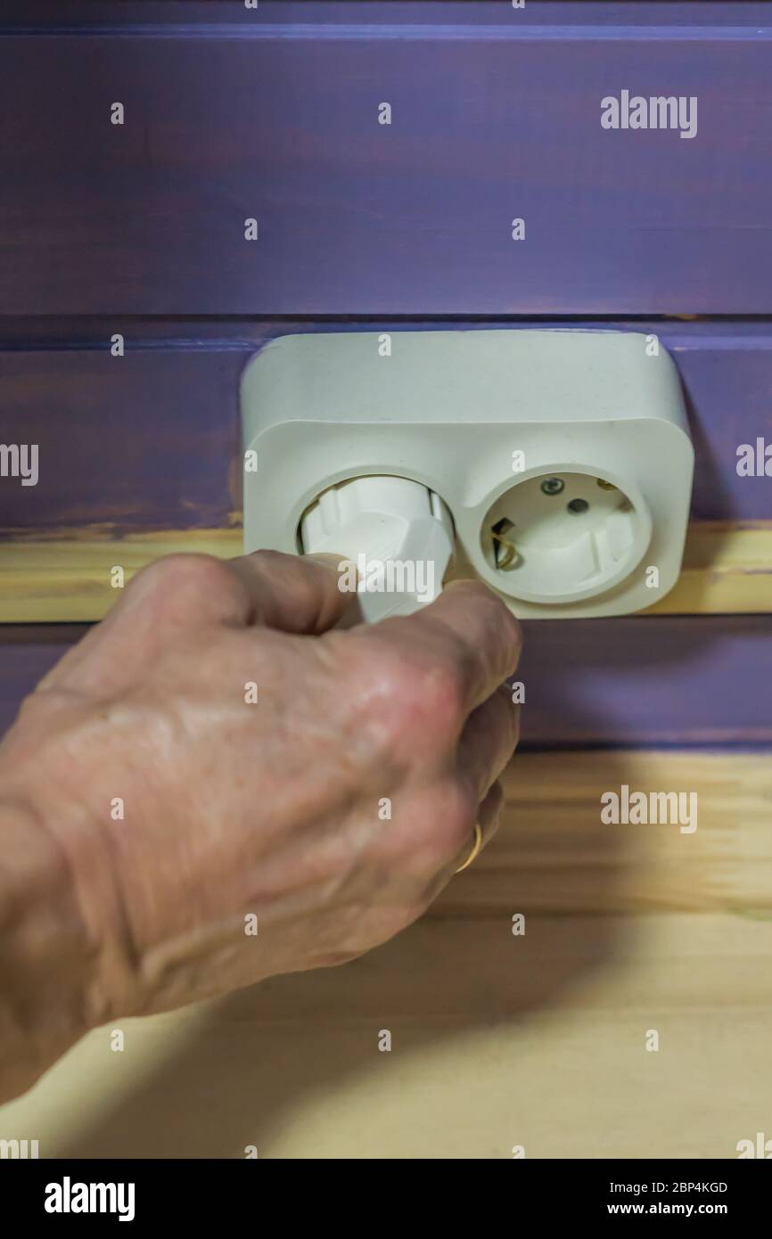 How to unplug from the wall socket hi-res stock photography and images ...