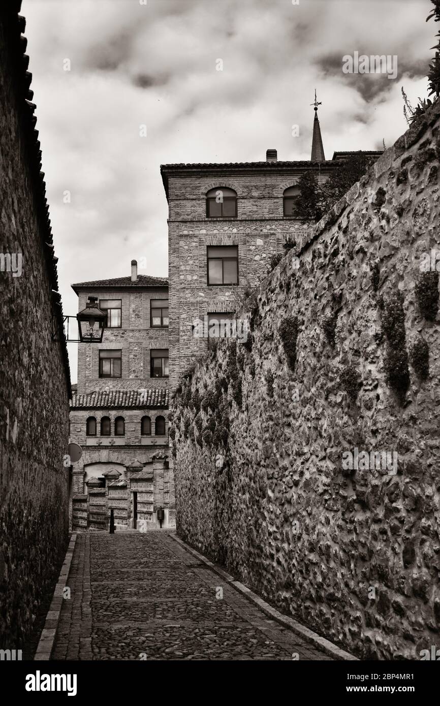 Segovia alley with old buildings street view in Spain Stock Photo - Alamy